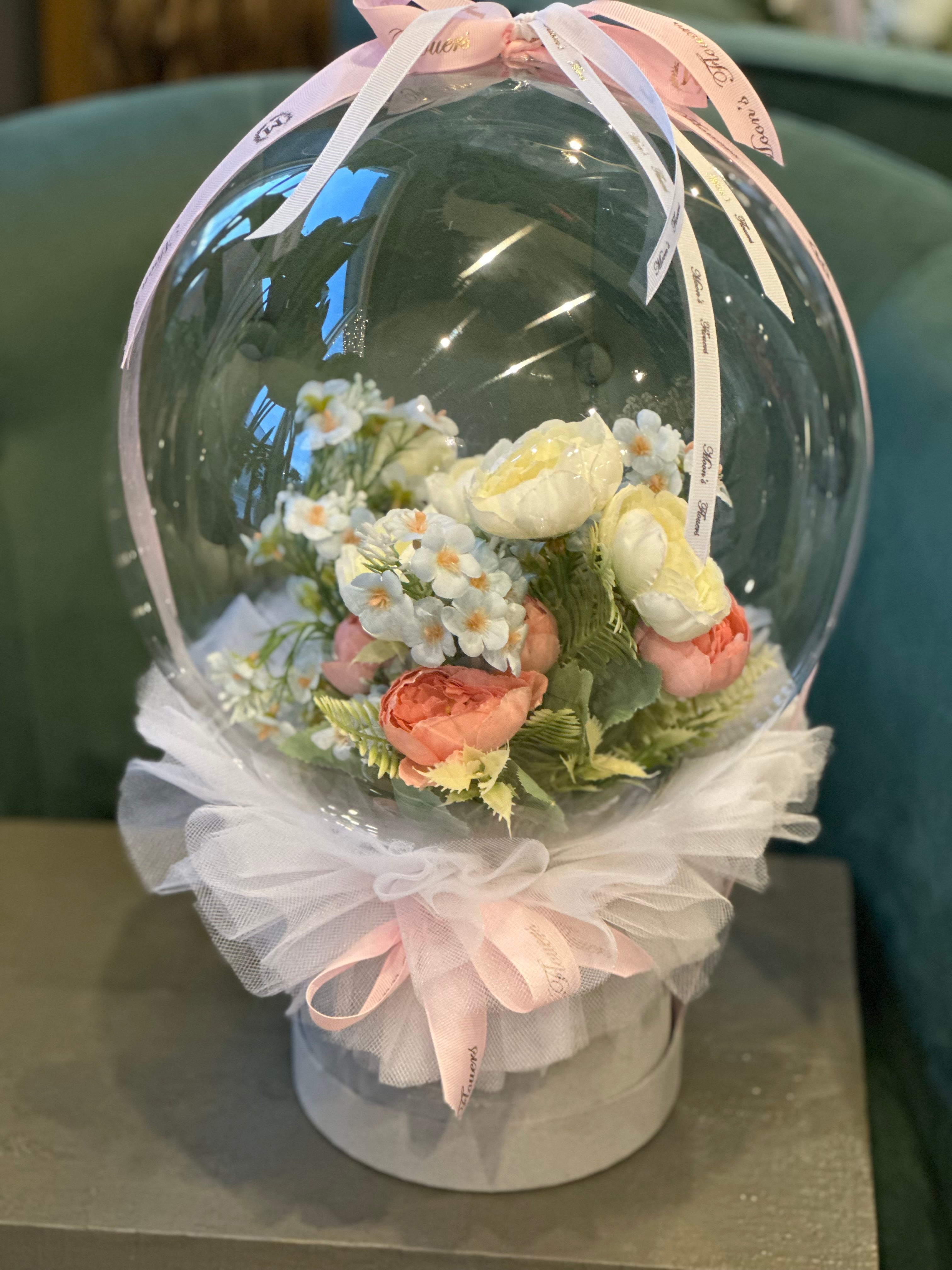 Flowers in balloons store